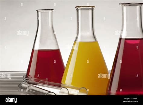 Close Up Detail Of Laboratory Beakers With Different Coloured Liquid In Them Stock Photo Alamy