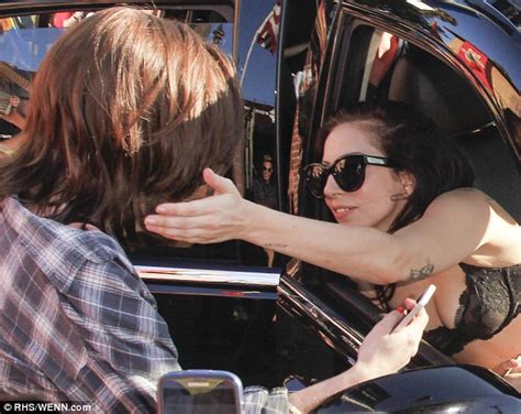 Lady Gaga Wears A Jewel Encrusted Sheer Bodysuit Over A Black Bra And