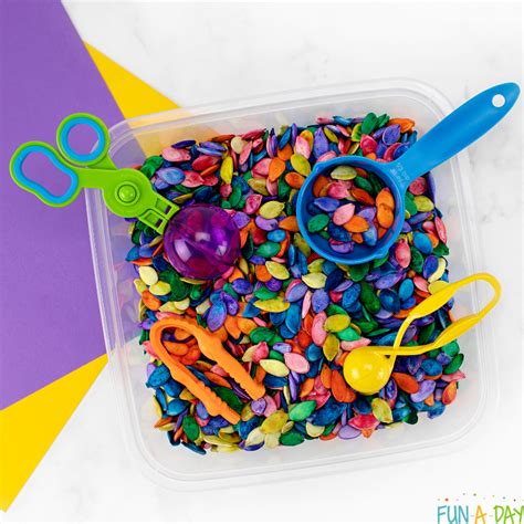 colorful pumpkin seed sensory bin fun a day