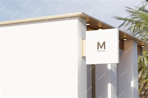 사무실 상점 건물의 외관에 로고 기호 모형 사각형 간판 상자 프리미엄 Psd 파일