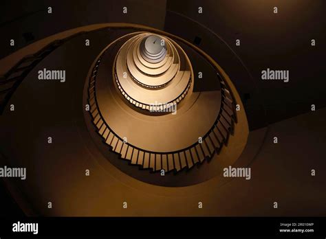 Spiral Staircase In A Tall Multi Floor House In The Form Of A Golden Ratio Architecture