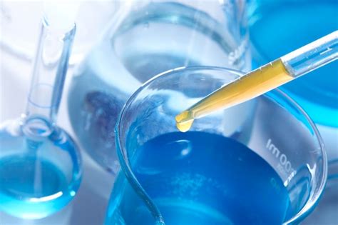 Premium Photo Science Laboratory With Beaker And Dropper