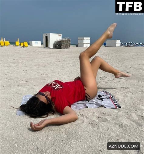 Claudia Romani Sexy Poses Showing Off Her Hot Ass Wearing An Ac Milan