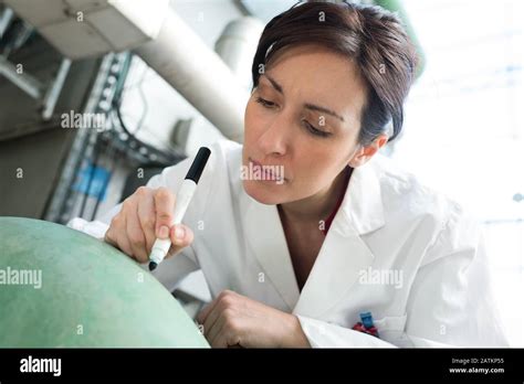 Assistant In Lab Taking Notes Stock Photo Alamy