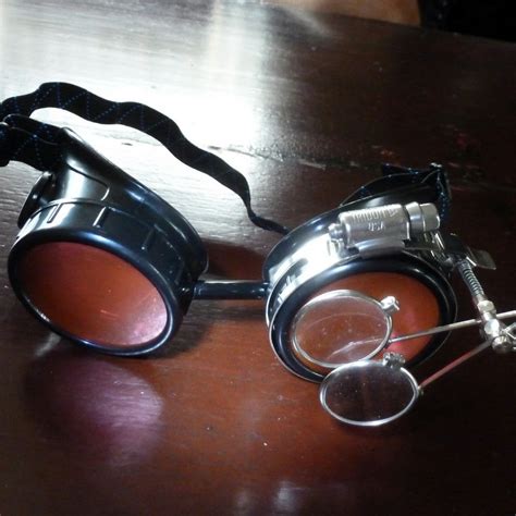 Black Goggles Red Lenes W Brass Watch Movement And Eye Loupe