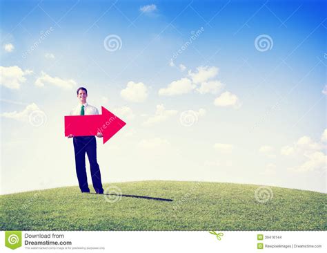 Business Man Outdoors Holding An Arrow Stock Photo Image Of Blank Copy