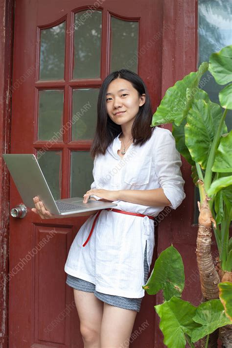 Woman Using Laptop Outdoors Stock Image F011 8987 Science Photo Library