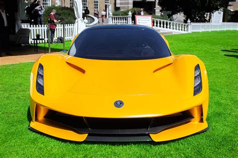 Download Bright Yellow Lotus Evija Car Wallpaper Wallpapers Com