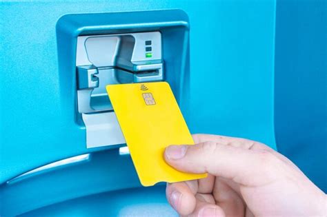 Premium Photo Hand Of A Person Putting Card In Atm Image Of An Atm Machine