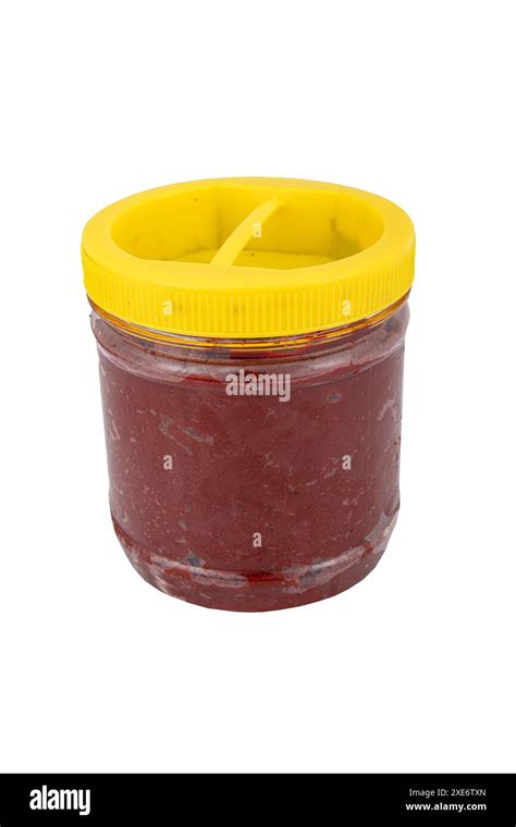 Hot Pepper Paste In Plastic Jar Isolated On White Background Plastic