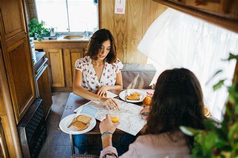 A Girl Points A Spot On The Map By Stocksy Contributor Marc Bordons Stocksy