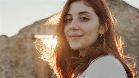 Premium Photo Beautiful Girl With White Dress Explores An Ancient
