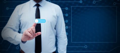 man standing holding tablet and pressing on virtual button business