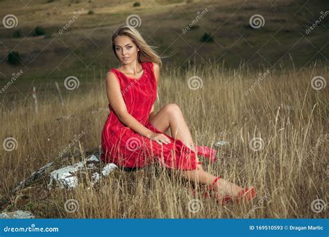 Beautiful Young Blonde Enjoys Walking Through Grass In Summer Stock Image Image Of Lifestyles