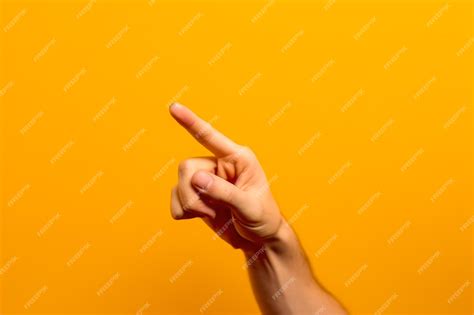 Premium Photo Index Finger On Yellow Background Have An Idea Generative Ai