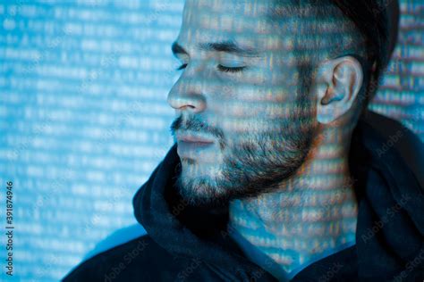 Portrait Of Hacker Man On Blue Neon Light Background Internet Technology Cyber Crime Cyber