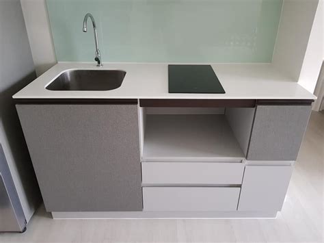 งานทำชุดครัว ตู้ทีวีและตู้รองเท้าใหม่เพราะน้ำรั่วจากซิ้งค์อ่างล้างจาน Designelement Renovate