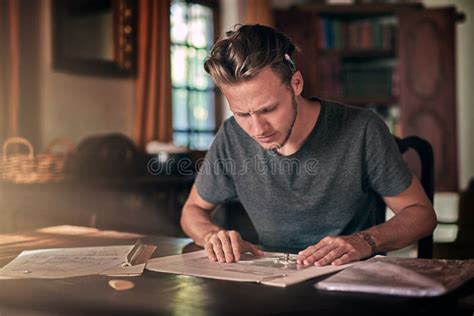Flexing His Brain Muscles A Diligent Young Student Doing A Homework