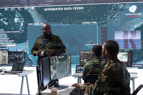 Military Personnel Operate Advanced Systems In A Command Center Focusing On Surveillance And