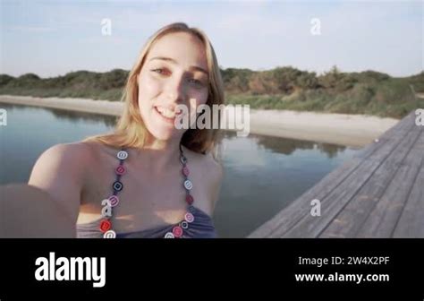 Beautiful Blonde Girl With Big Green Eyes In Video Call Pov Waving