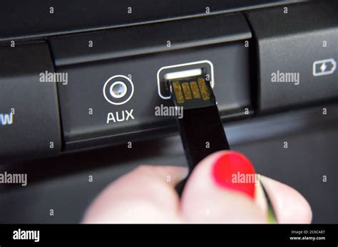 Plugging USB Storage Into The USB Port On The Car Dashboard Stock Photo Alamy