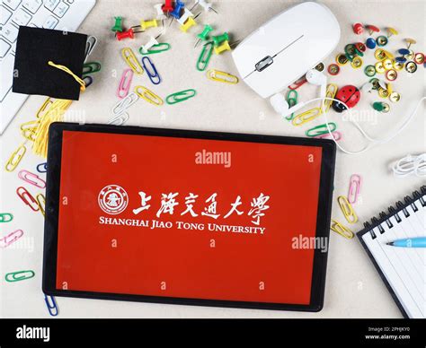 In This Photo Illustration Shanghai Jiao Tong University Logo Seen Displayed On A Tablet Stock