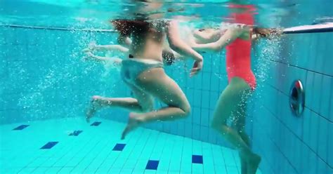 Nude Girls Float Around Underwater