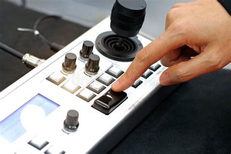 Engineer Uses Machine Control Panel Buttons And Joystick In Factory Stock Photo Image Of