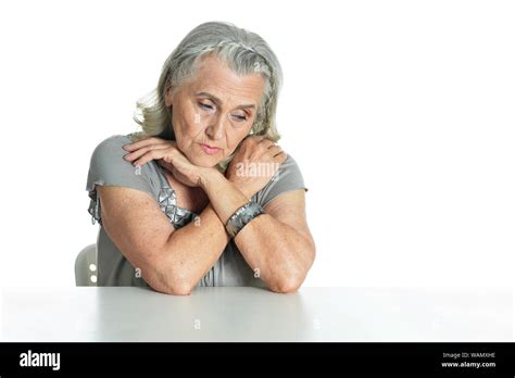 Sad Senior Woman Posing Isolated On White Background Stock Photo Alamy