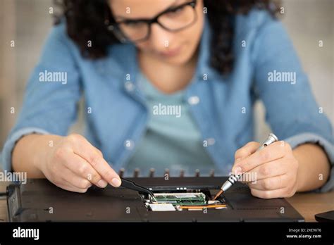 A Woman During The Installation Of Pc Stock Photo Alamy