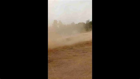 Raging Dust Devil Tornado Whips Across Dry Farm Field