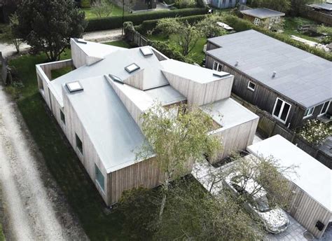 The Nuances Of Scandinavian Natural Light Reflected In The Roof House