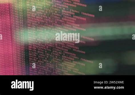 Red Computer Software Code Moving On A Black Monitor Reflect On Glass