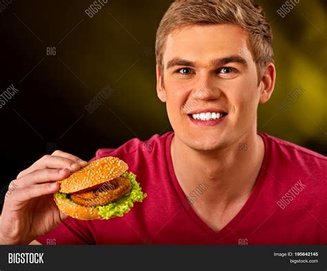Man Eating Hamburger Image And Photo Free Trial Bigstock