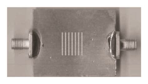 Photograph Of A 7 Cell Microstrip Slotted Ground Plane Prototype A Download Scientific