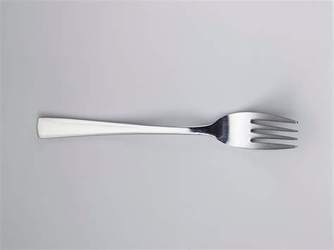Premium Photo Close Up Of Fork On White Background