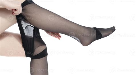 Woman Putting Stockings Stock Photo At Vecteezy