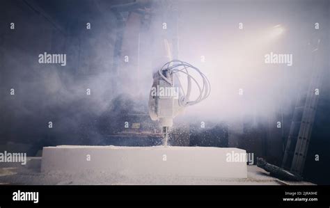 Time Lapse Of Robotic Arm Milling Machine Cutting Block Of Polystyrene