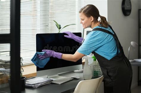 Woman Cleaning Computer Screen In Office Stock Image Image Of Cleaner