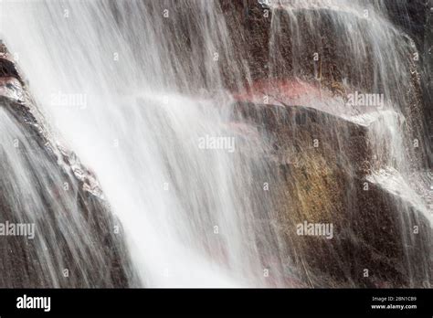 Stunning Close Up Details Of Powerful Waterfall Cascading Down The Red