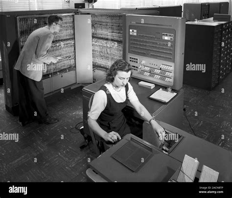 Early Computers People Working With IBM Type 704 Electronic Data Processing Machines