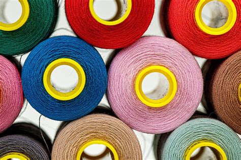 Premium Photo Set Of Multicolored Spools Of Thread For Sewing