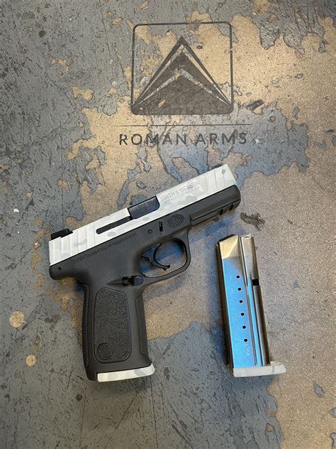 Custom Camo Smith And Wesson Sd9 Cerakoted Using Bright White And Bull