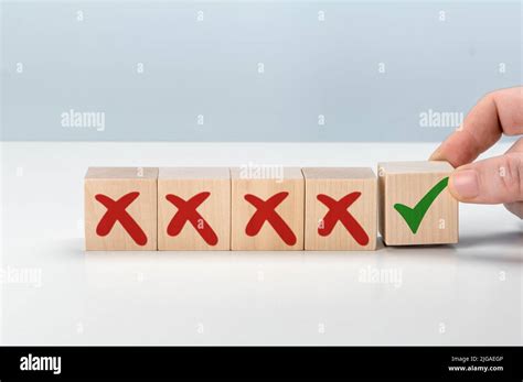 Man Hand Selects Checkbox With Green Checkmark From Row Of Multiple