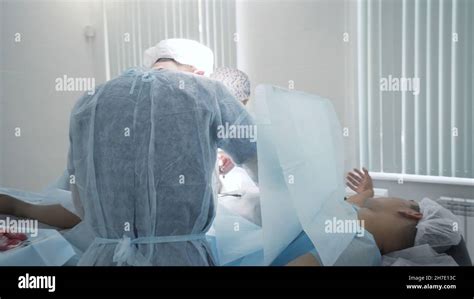 Surgeons Perform Operation Under Anesthesia Action Two Professional Surgeons Perform Operation