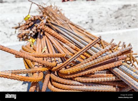 Steel Bars Stacked For Construction Classified By The Bending Shape At