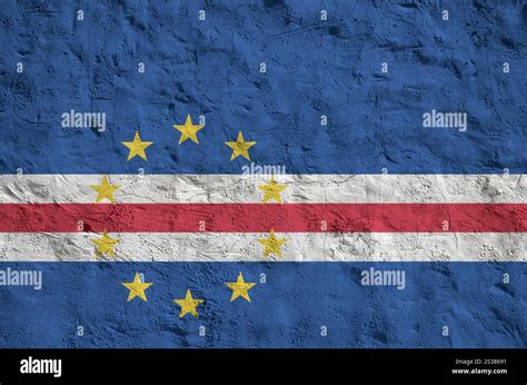 Cabo Verde Flag Depicted In Bright Paint Colors On Old Relief
