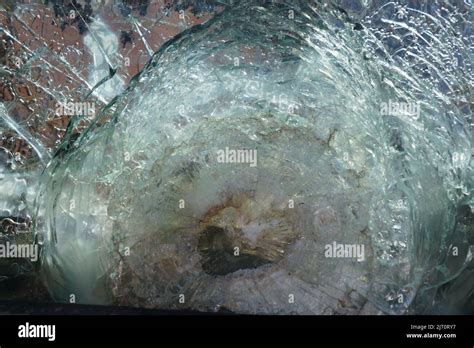 Armored Glass After Of A Direct Hit From An Automatic Weapon Safety Glass After Being Hit By A