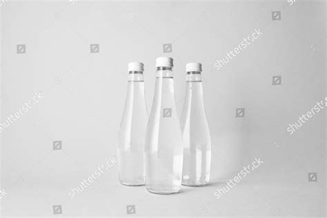 Water Bottles Mock Up Three Empty Water Bottles Sitting Next To Each Other Food Images