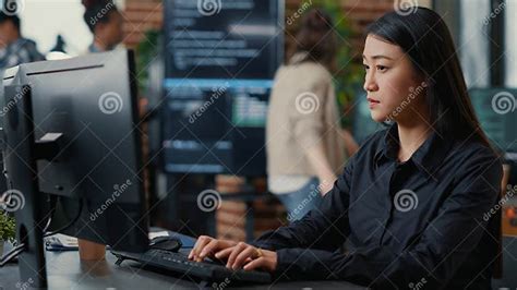 Programer Writing Algorithm Focused On Compiling Source Code Sitting At